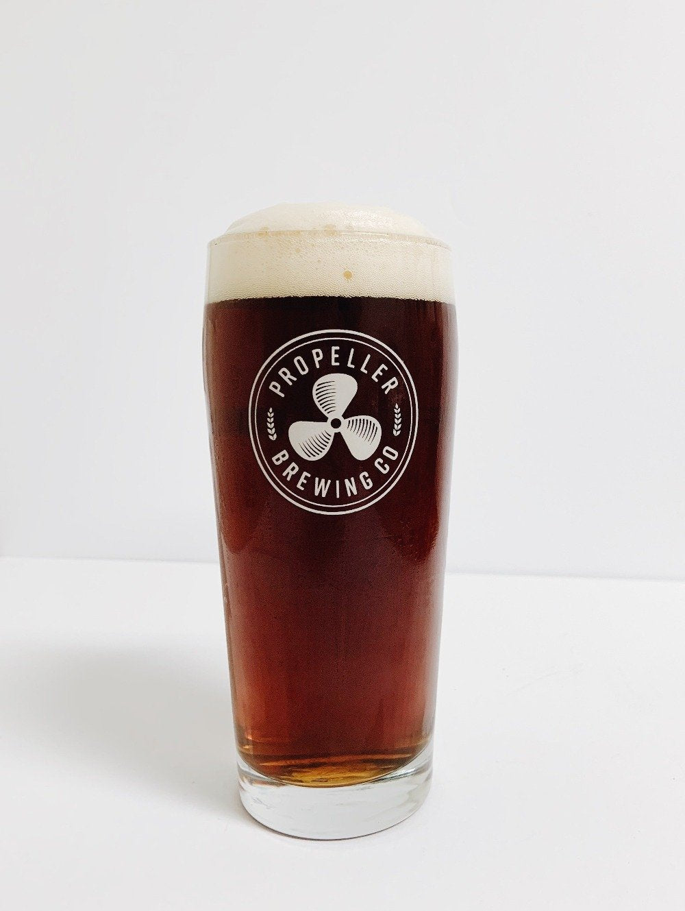 20oz Nucleated Pint Glass – Propeller Brewing